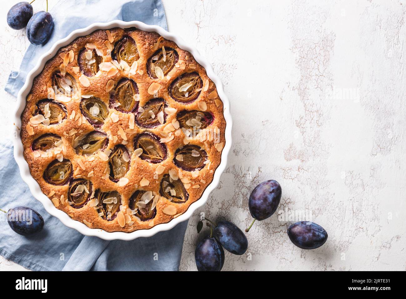 Traditional American plum torte on white table Stock Photo - Alamy