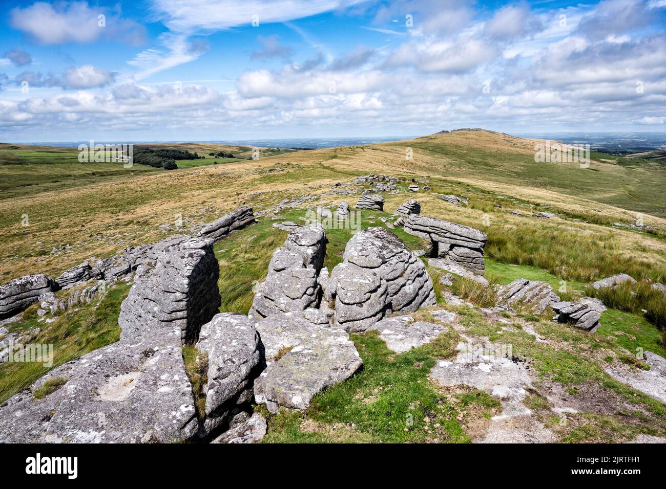 Granite outcrops on Oke Tor, and a view along Belstone Ridge towards ...