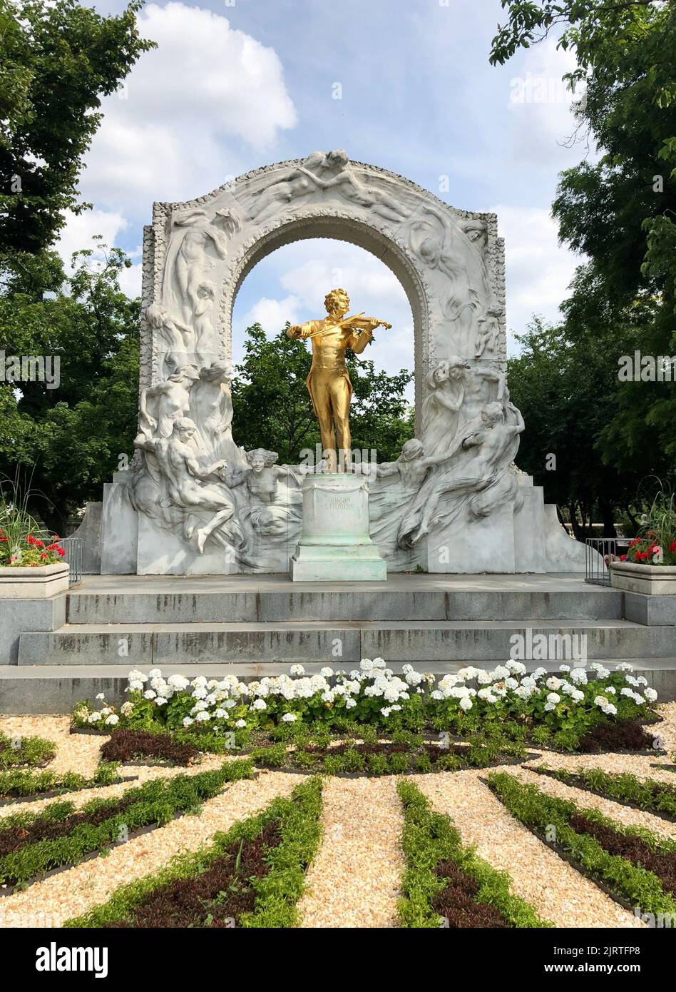 Golden statue of Johann Strauss located in Stadtpark. Famous ...