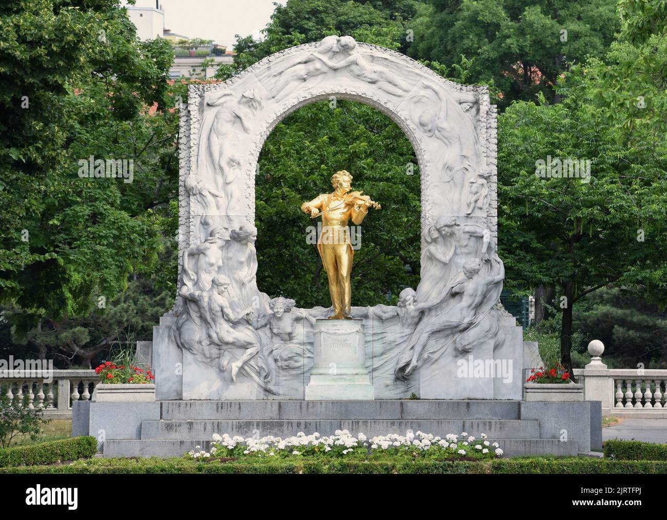 Golden statue of Johann Strauss located in Stadtpark. Famous ...