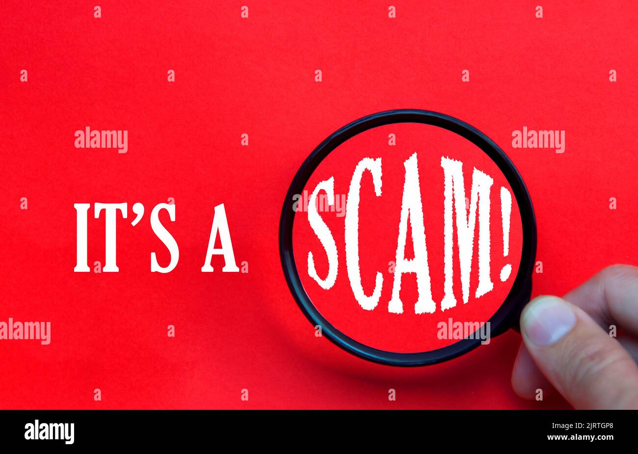 It's a scam text on red cover with hand holding magnifying glass ...