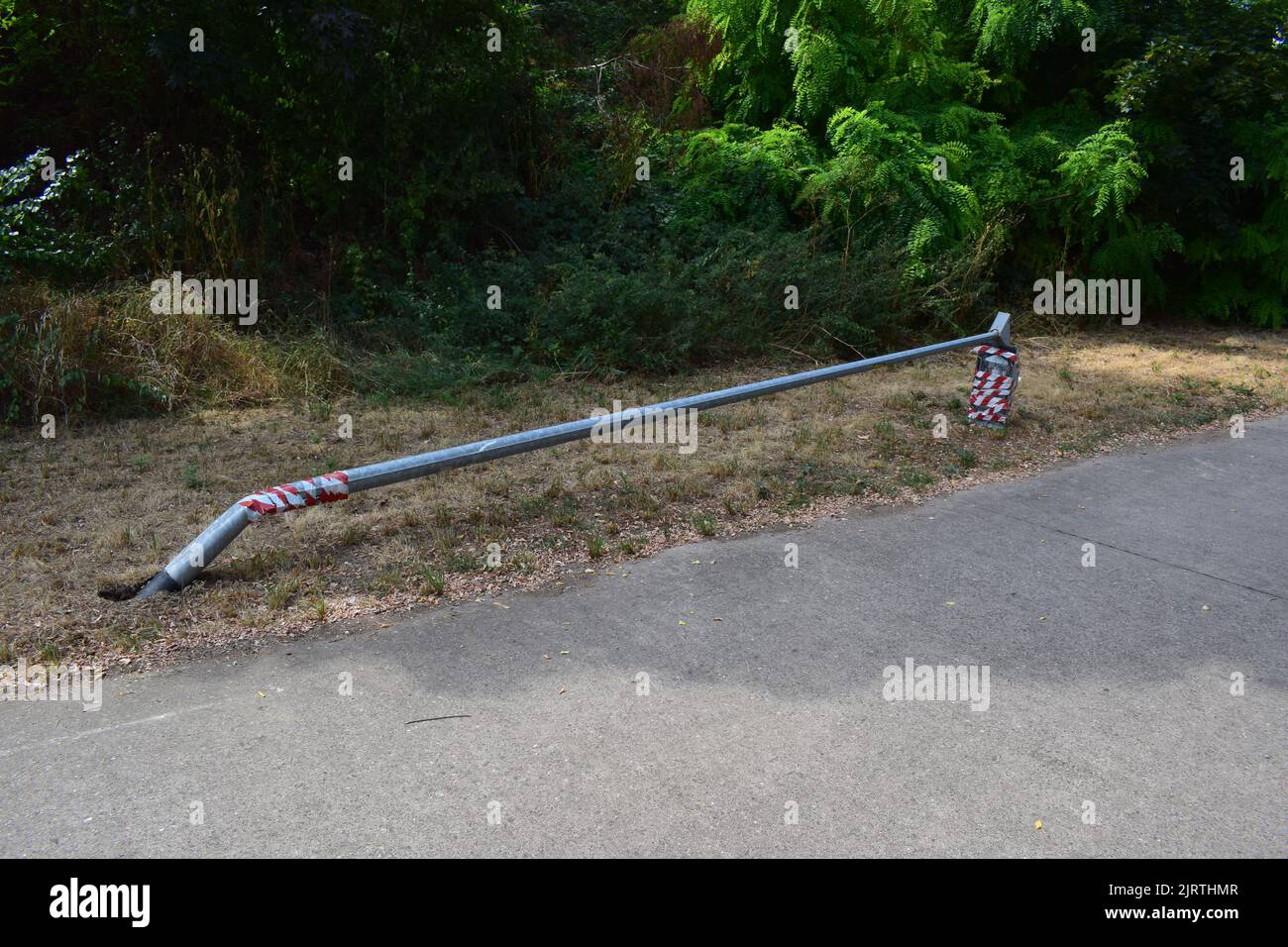 fallen lamp post Stock Photo - Alamy