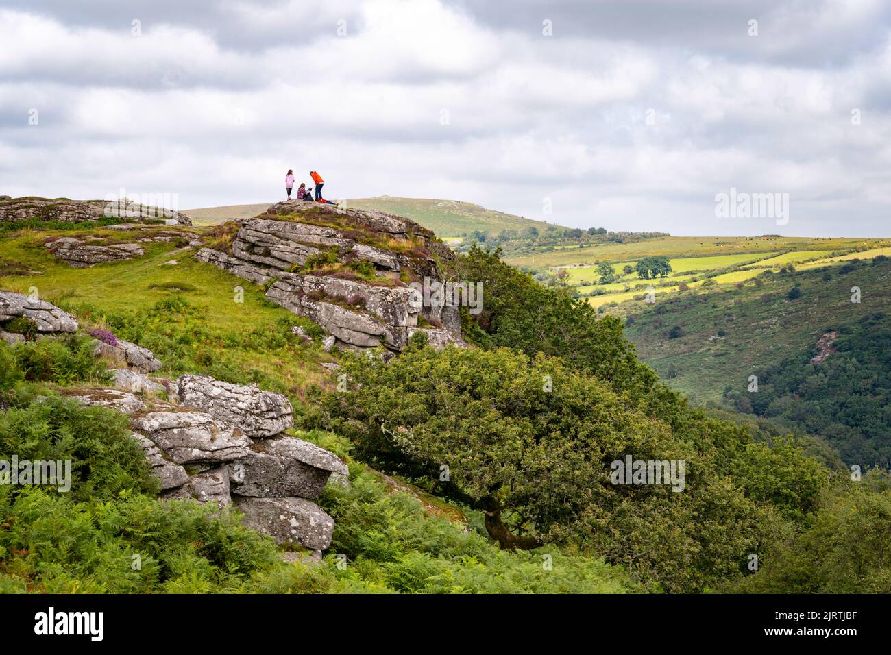 Hikers relax on Bench Tor, near Venford Reservoir, Dartmoor National ...