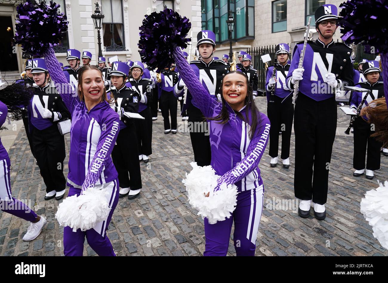 Members of the Northwestern University Wildcat Marching Band and ...