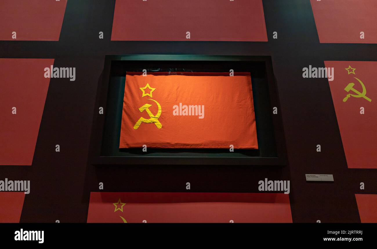 A picture of multiple Soviet Union flags, taken inside the Museum of the Second World War, in ...