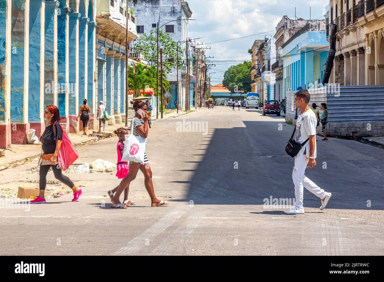 Lifestyle of real Cuban people who are walking in a city street ...