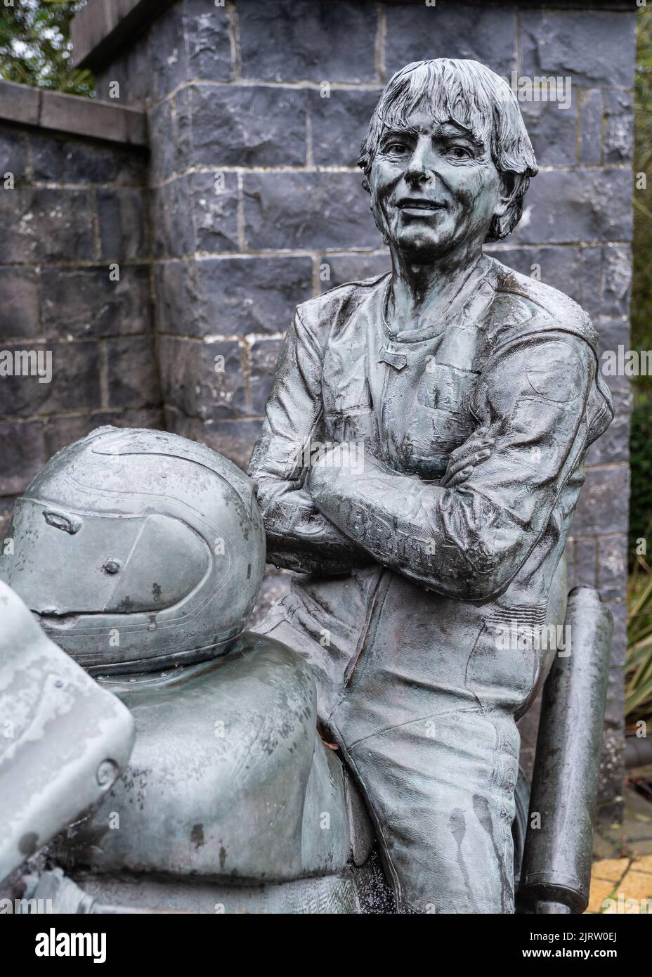 The statue of motorcycle racing legend Joey Dunlop in the memorial ...