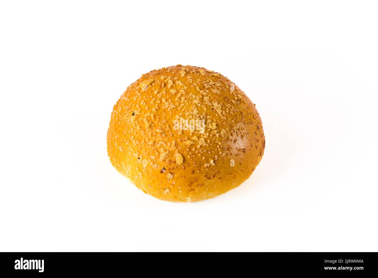 Close studio shot of a round sweet bun with crumble topping over white ...