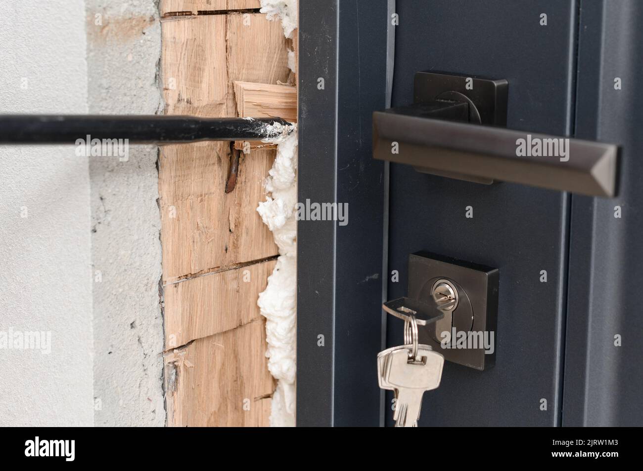 Keys in the door lock of interior doors, mounting foam and doors Stock ...