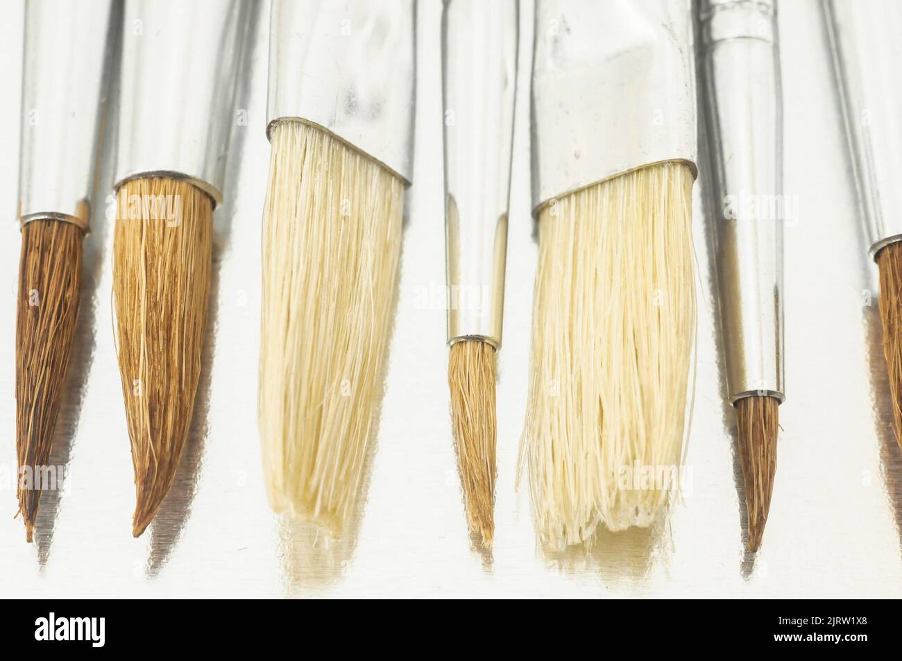 New Wooden Different Paintbrush Set Texture over a Colored Background ...