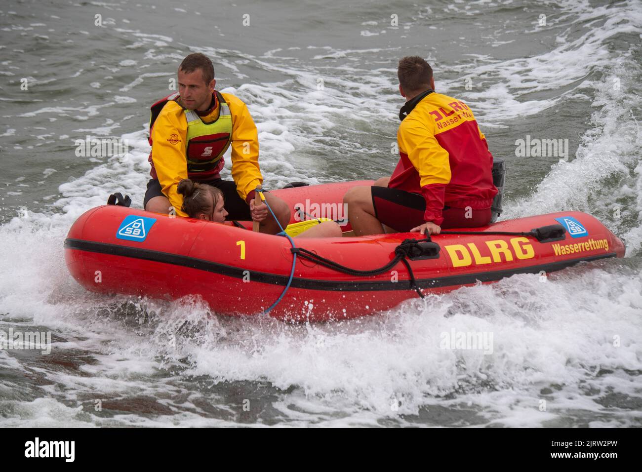 26 August 2022, Mecklenburg-Western Pomerania, Göhren: DLRG lifeguards ...