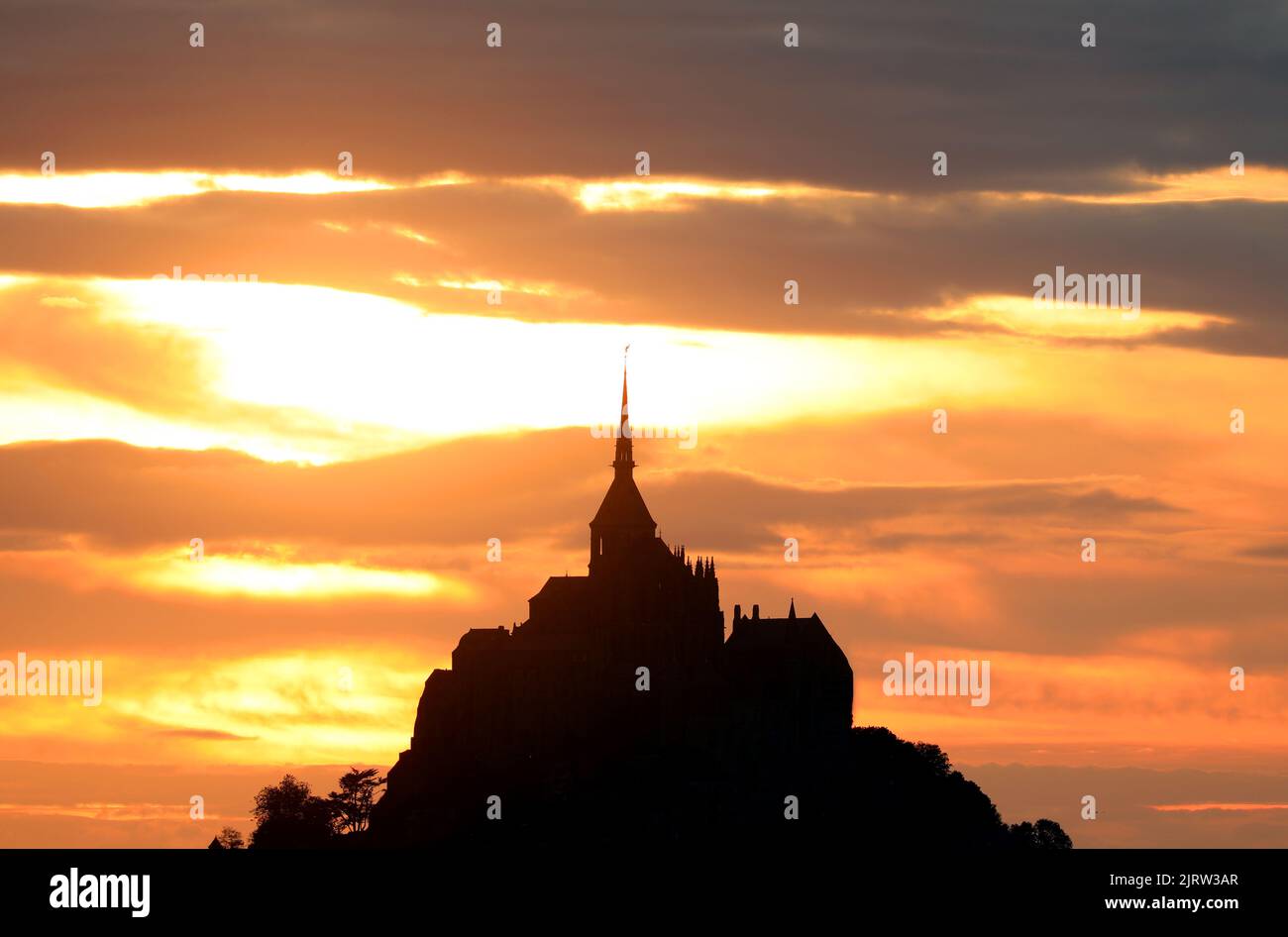 breathtaking sunset of the island with the silhouette of the abbey of ...
