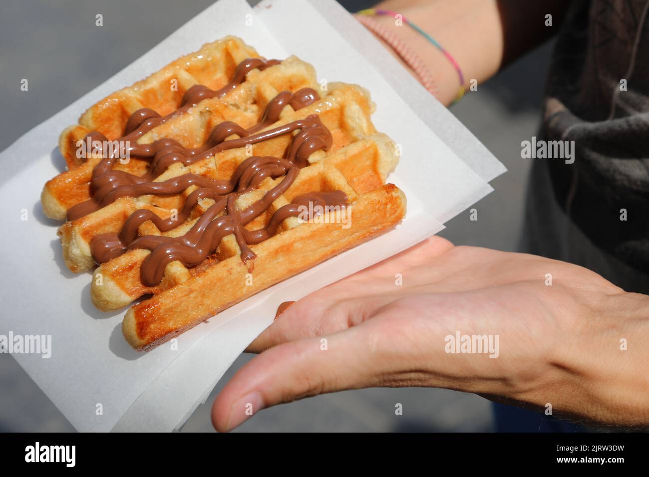 Chocolate hands belgium hi-res stock photography and images - Alamy