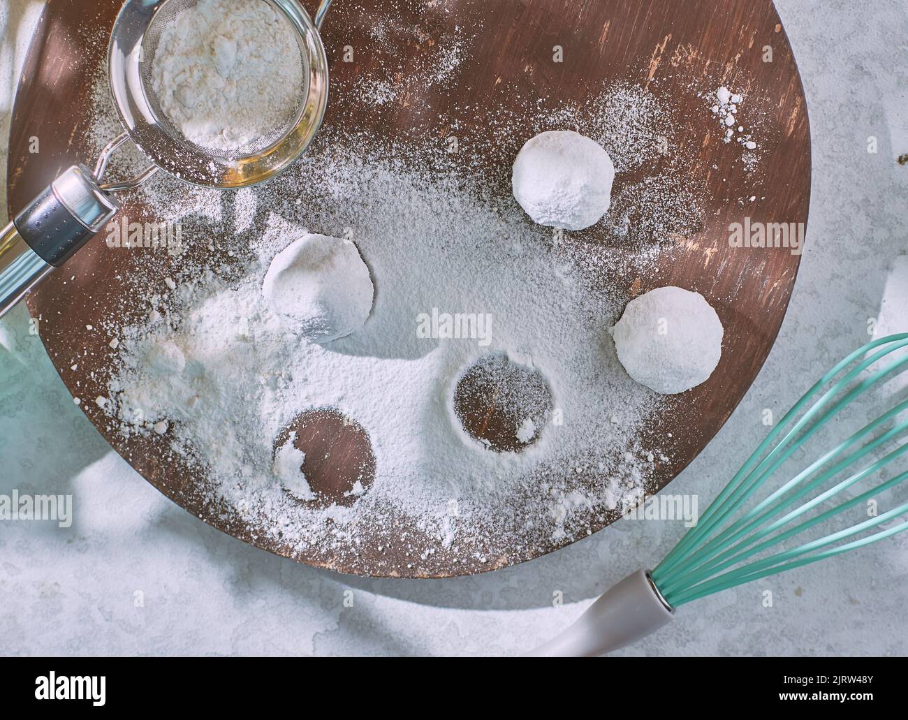A baking material with cookies on a wooden plate Stock Photo - Alamy