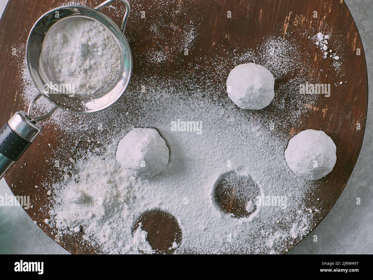 A baking material with cookies on a wooden plate Stock Photo - Alamy