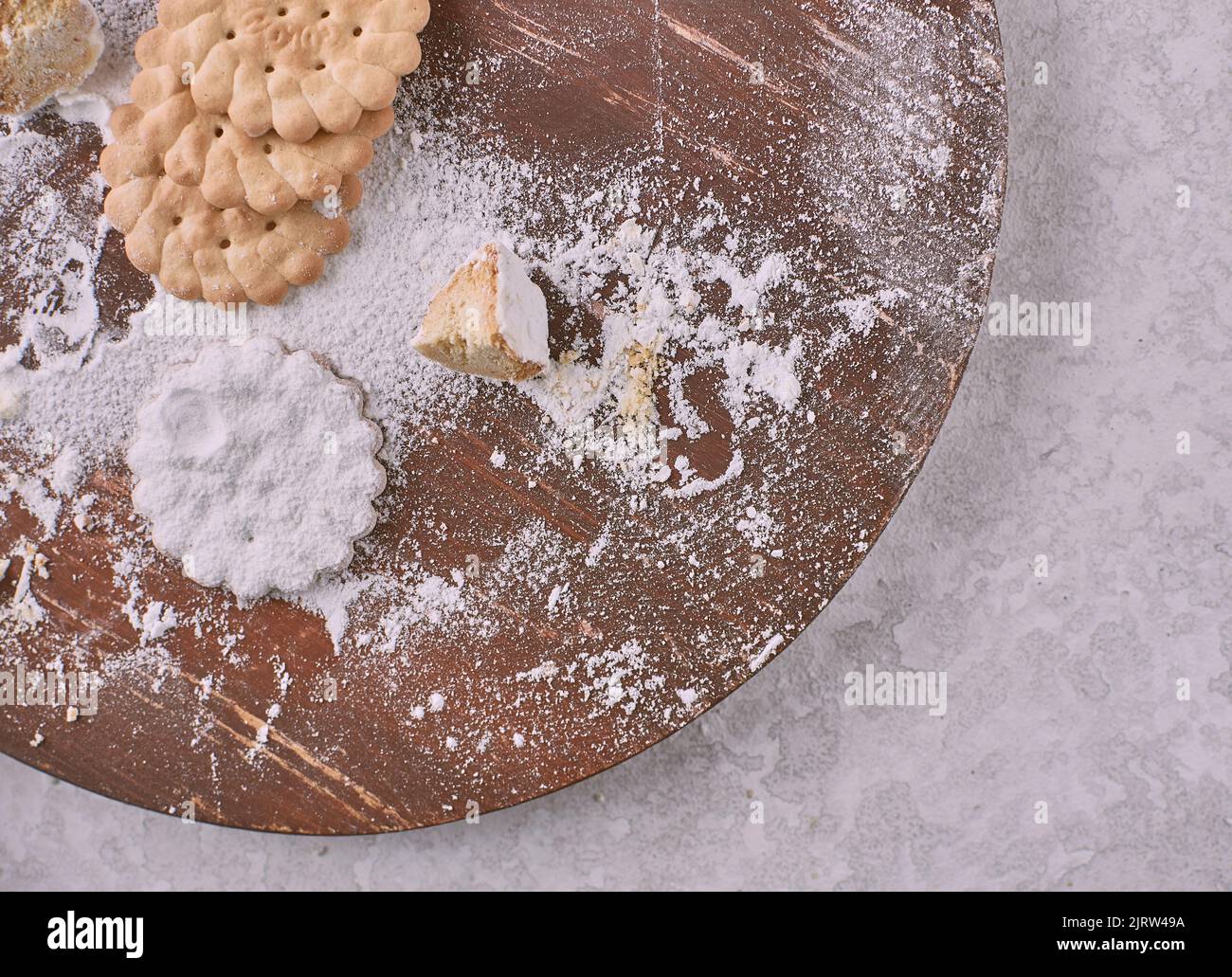 A baking material with cookies on a wooden plate Stock Photo - Alamy