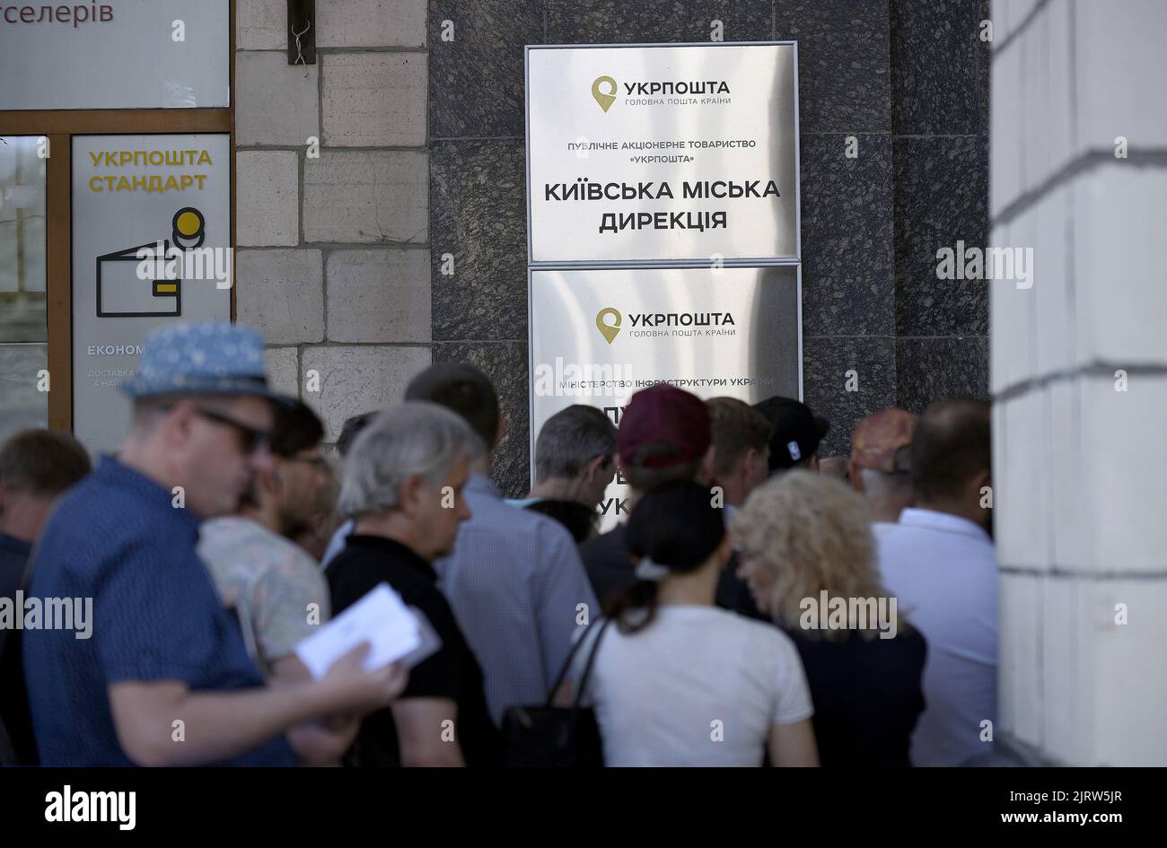 KYIV, UKRAINE - AUGUST 26, 2022 - People queue at the Central Post ...