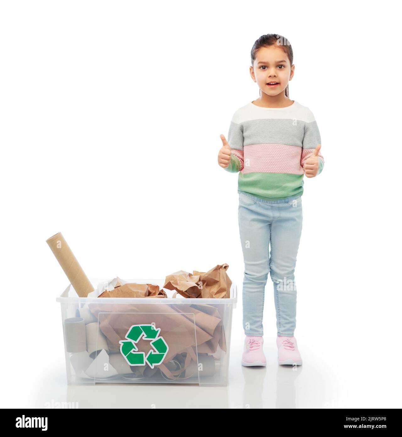 girl sorting paper waste and showing thumbs up Stock Photo - Alamy