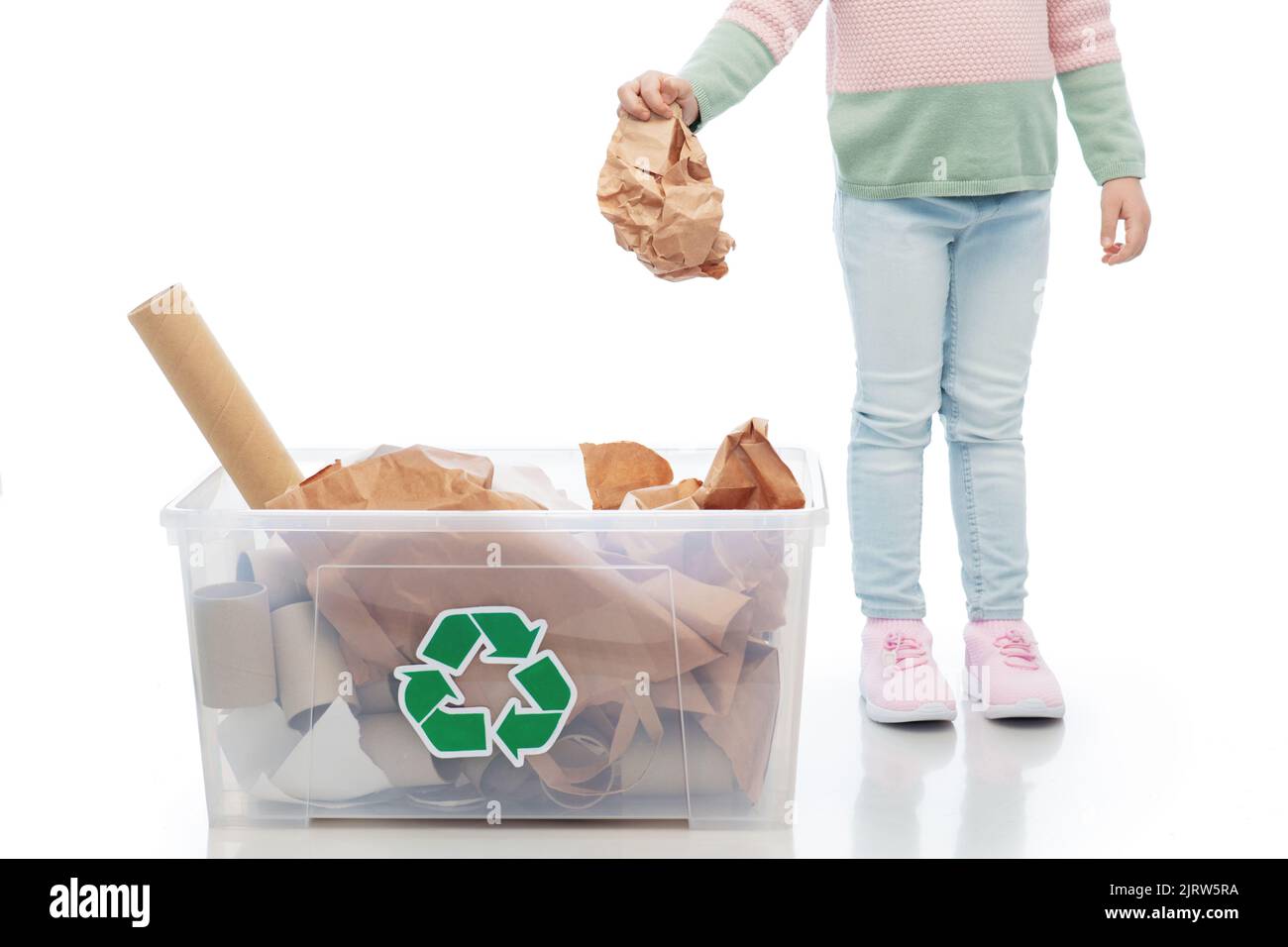 girl sorting paper waste Stock Photo - Alamy