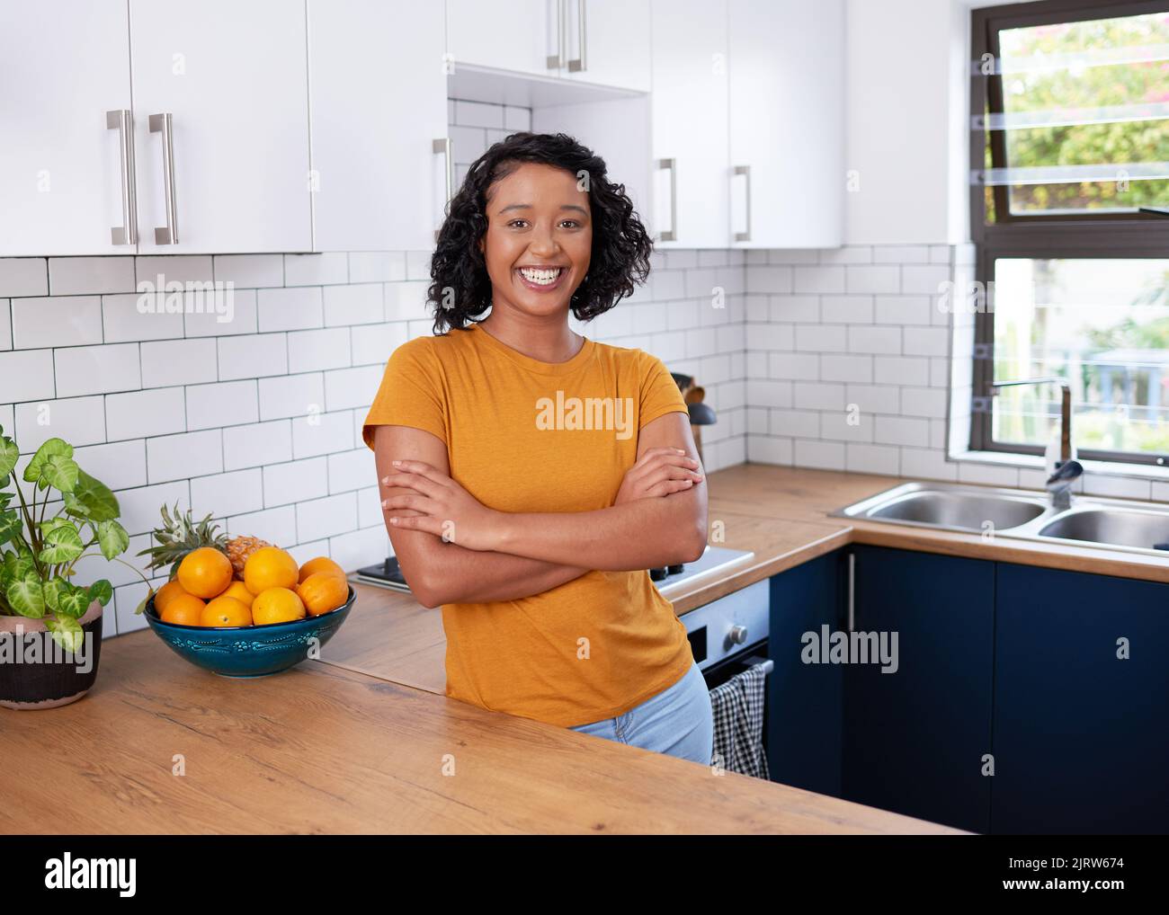 Young woman stands in bright hi-res stock photography and images - Alamy