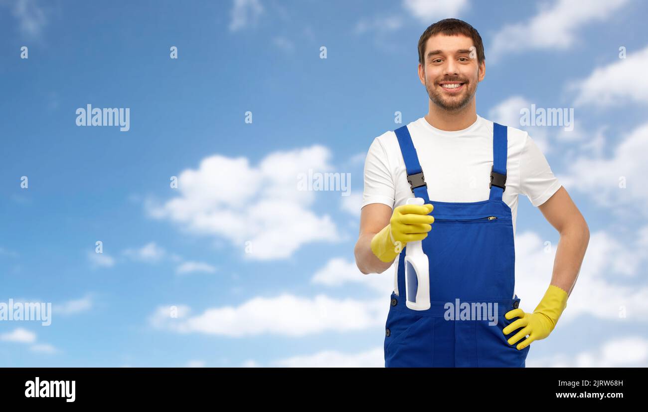 male cleaner cleaning with detergent Stock Photo - Alamy