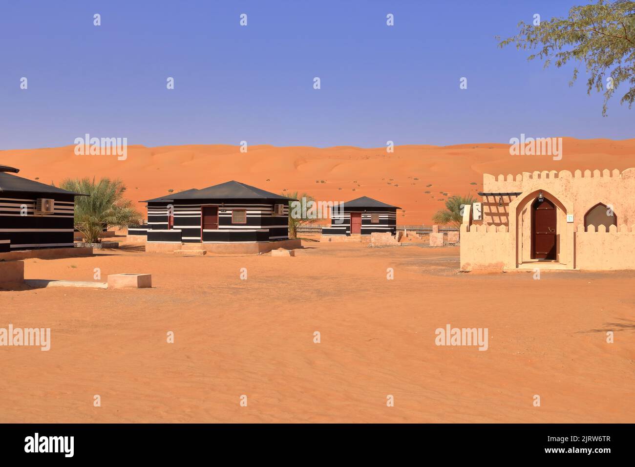 Bedouin style camping beside a huge sand dune at the Wahiba Sands ...