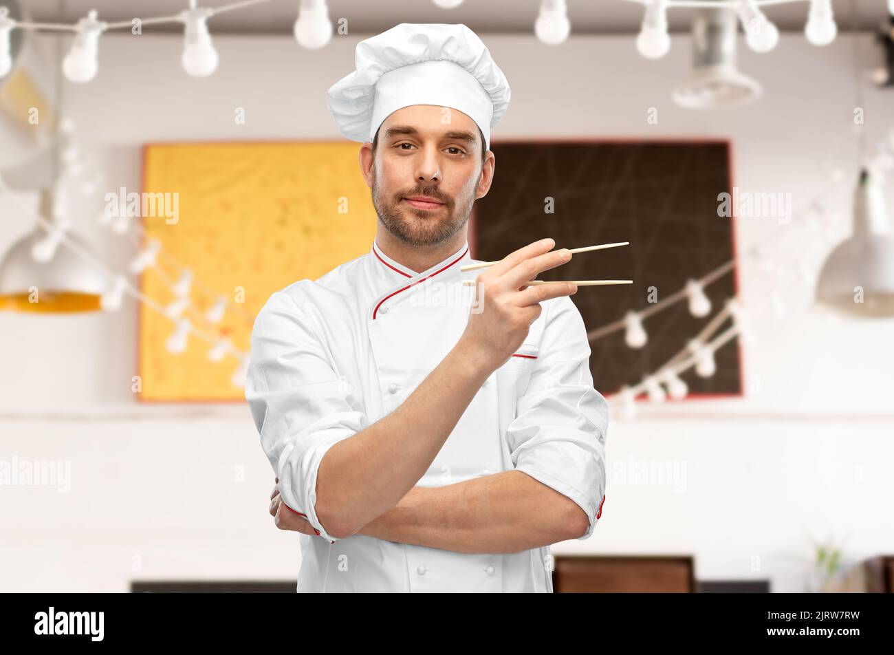 serious male chef with chopsticks Stock Photo - Alamy
