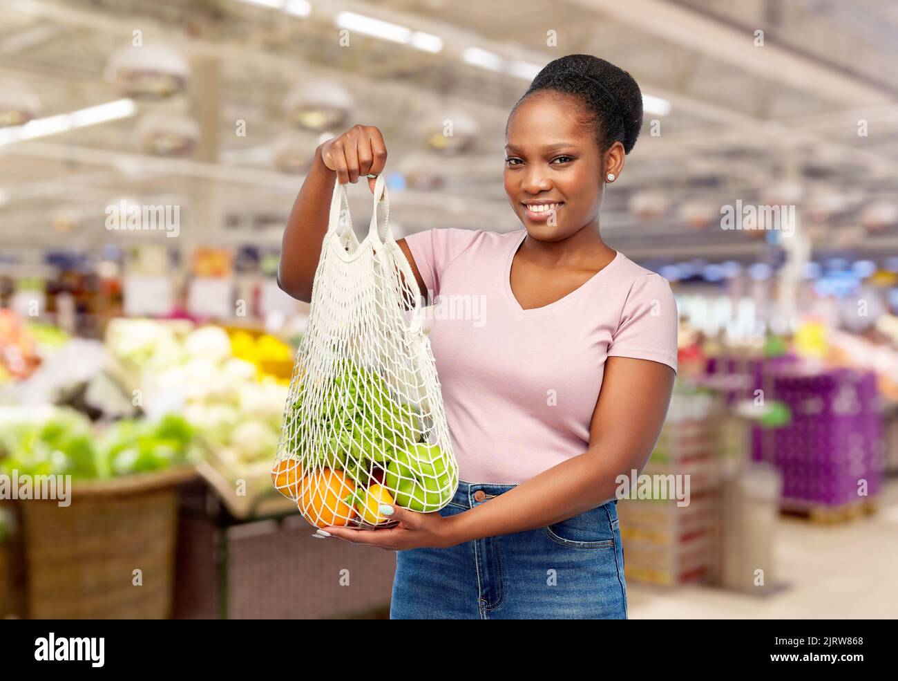 african woman with food in reusable string bag Stock Photo - Alamy african woman with food in reusable string bag Stock Photo - Alamy