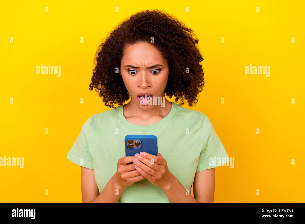 Photo of shocked stupor lady wear green t-shirt chatting modern gadget ...