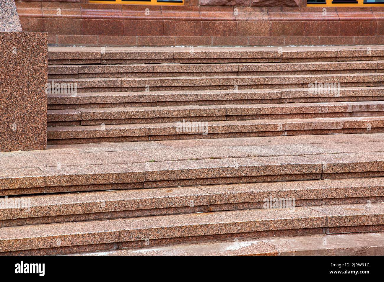 Stone stairs with granite steps and spans rise to the facade of the ...