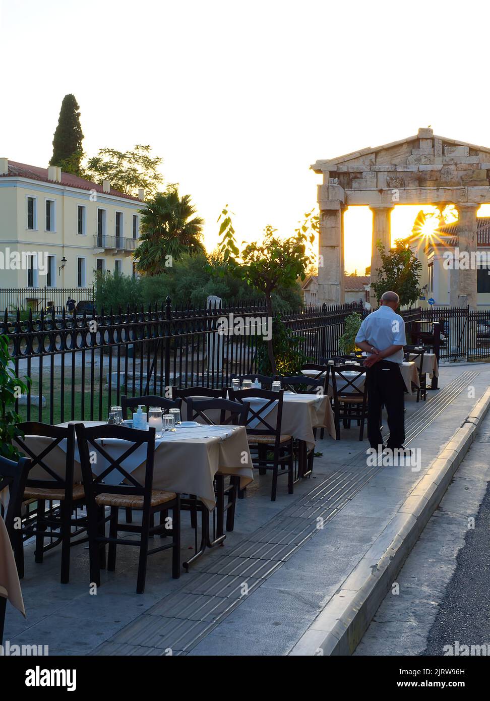 Dining table next to Athenian ancient forum Stock Photo - Alamy