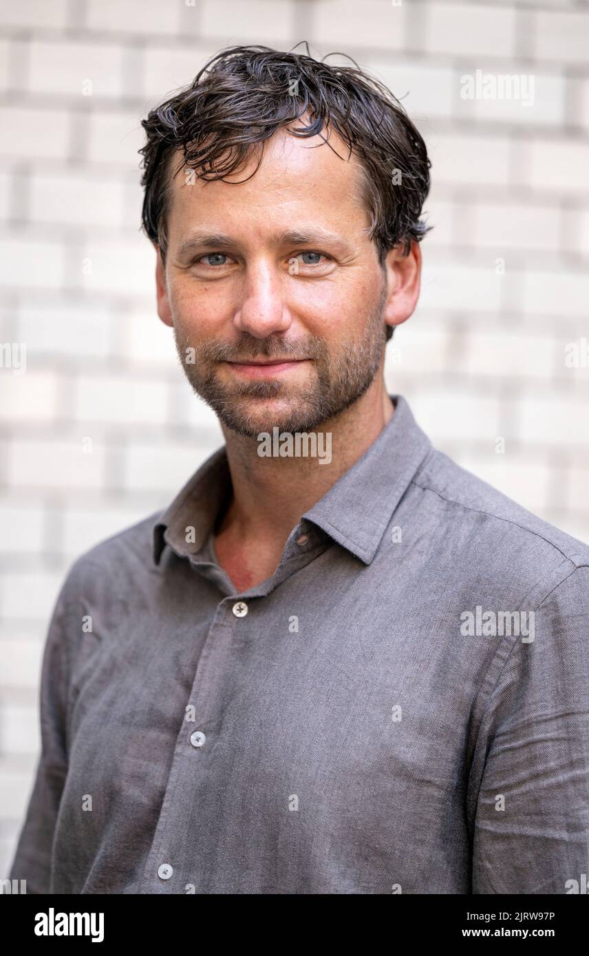 Berlin, Germany. 26th Aug, 2022. Actor Florian Stetter stands in front ...