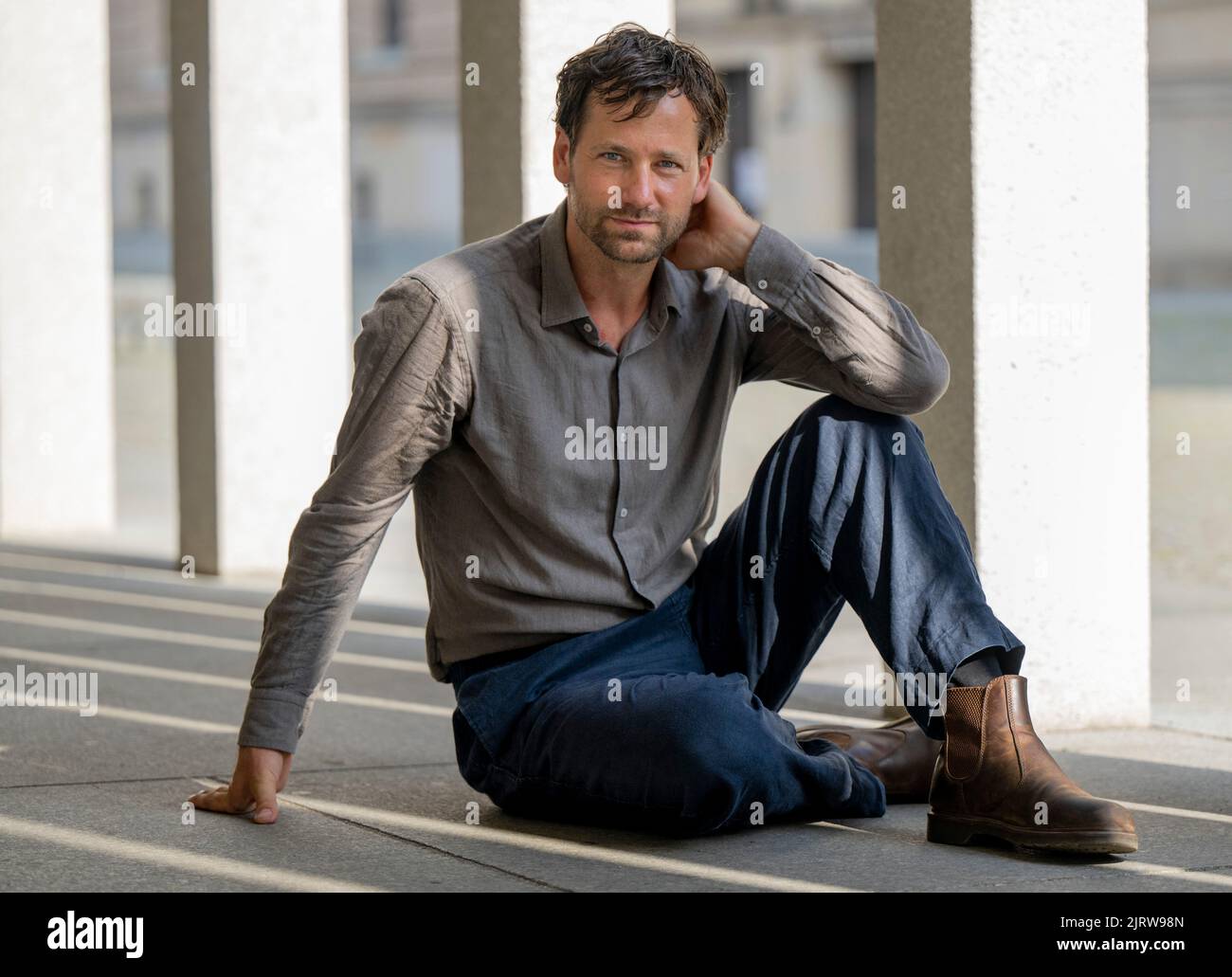 Berlin, Germany. 26th Aug, 2022. Actor Florian Stetter sits at the ...