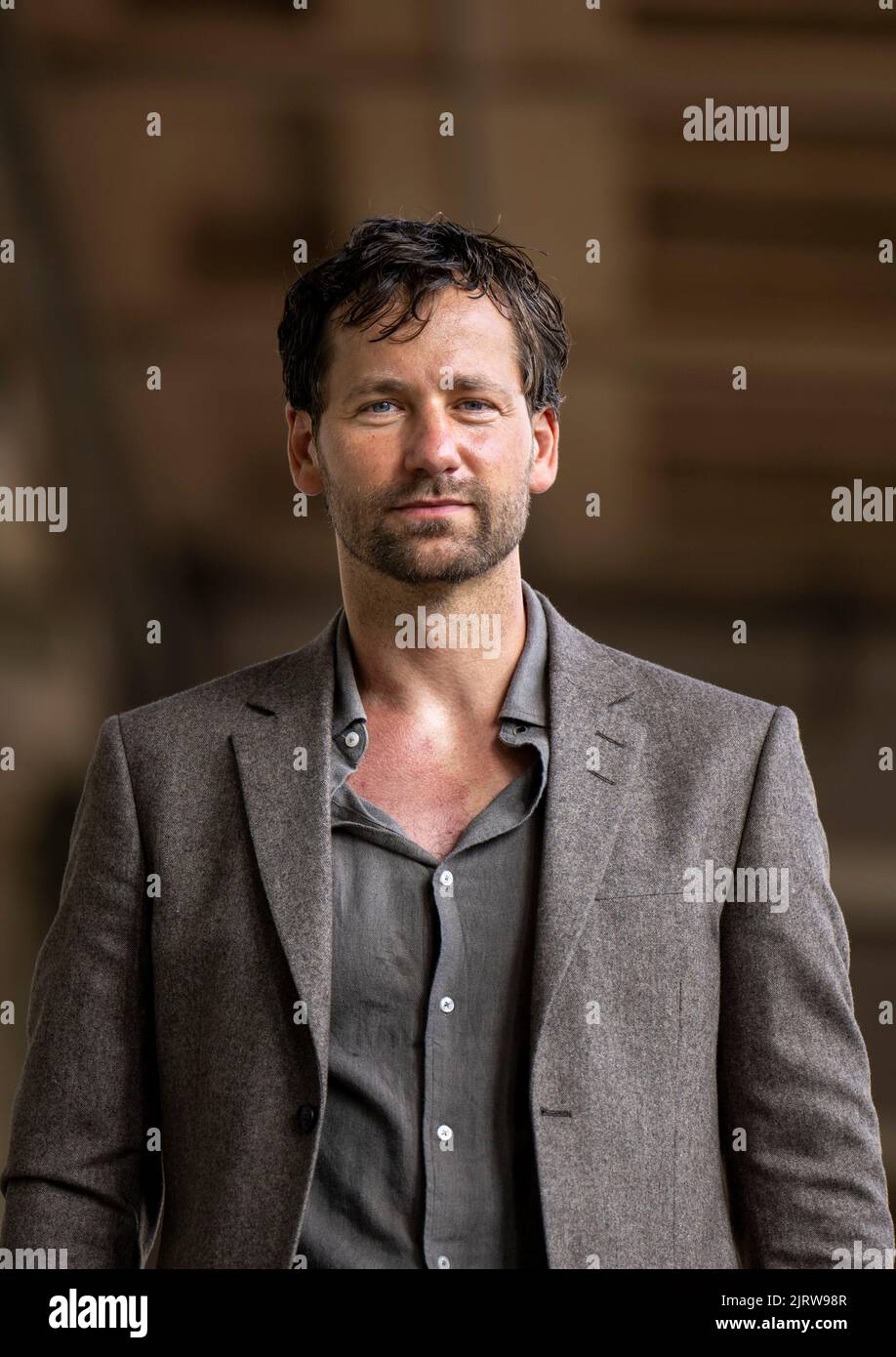 Berlin, Germany. 26th Aug, 2022. Actor Florian Stetter stands in front ...