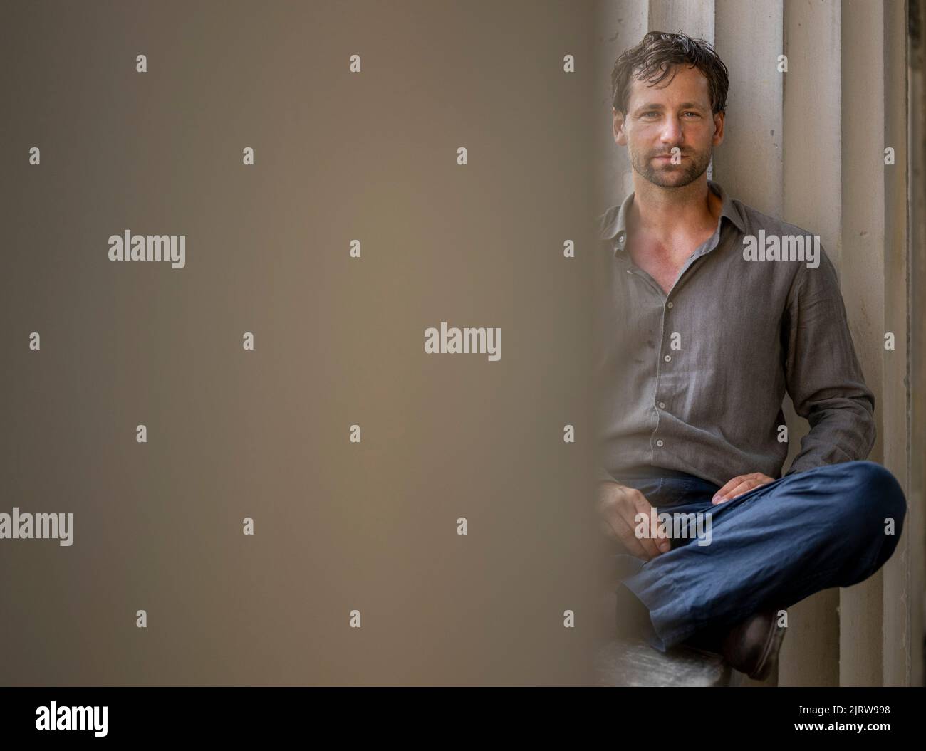 Berlin, Germany. 26th Aug, 2022. Actor Florian Stetter sits at the ...