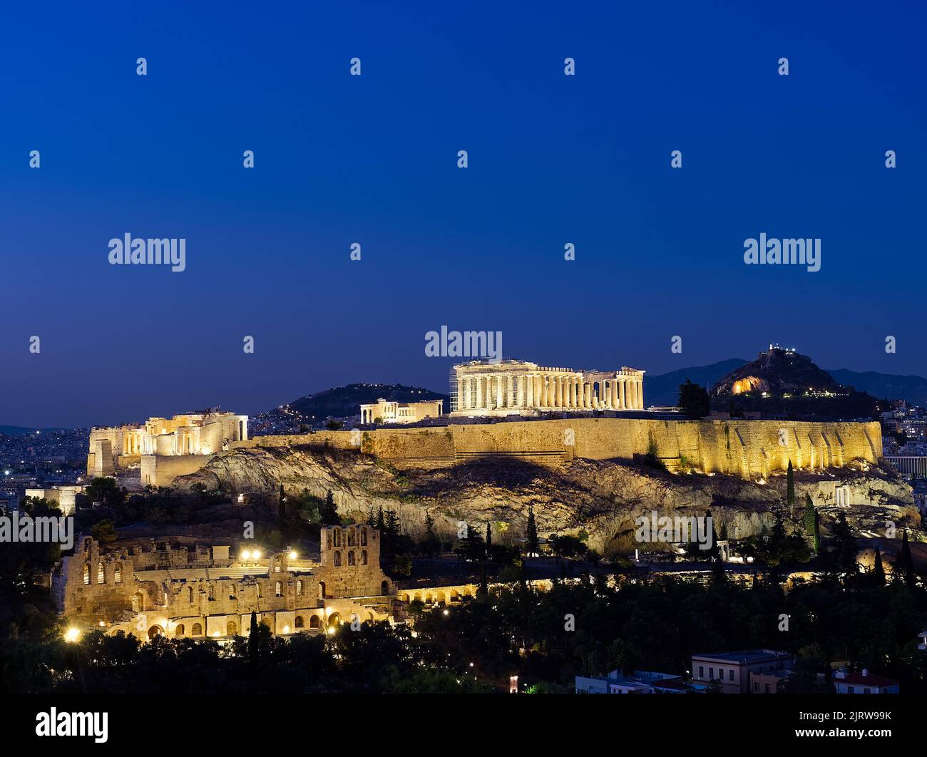 Acropolis in summer during blue hour Stock Photo - Alamy