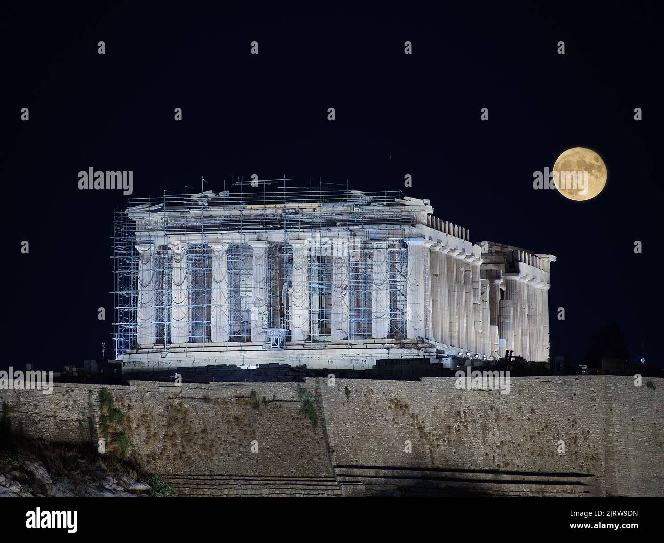 Acropolis in August under the moonlight Stock Photo - Alamy
