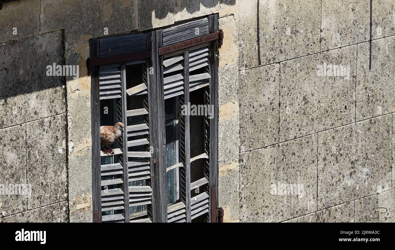 A an old window of an old building in Aigues-Mortes, Gard, France Stock ...