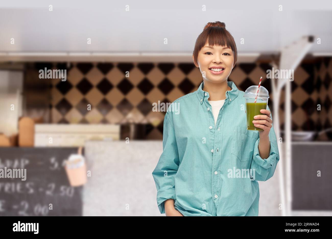 happy asian woman with juice over food truck Stock Photo - Alamy