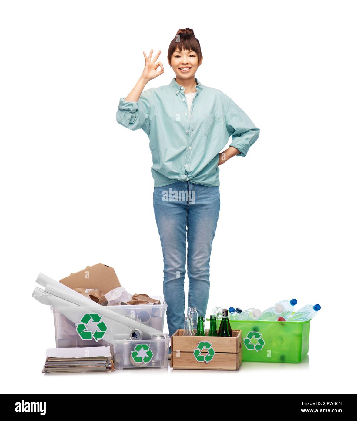happy woman sorting paper, metal and plastic waste Stock Photo - Alamy