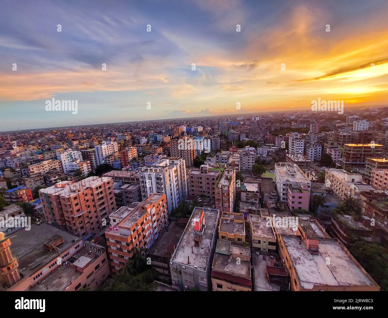 Cloudy blue sky in the gap of high raise building Stock Photo - Alamy
