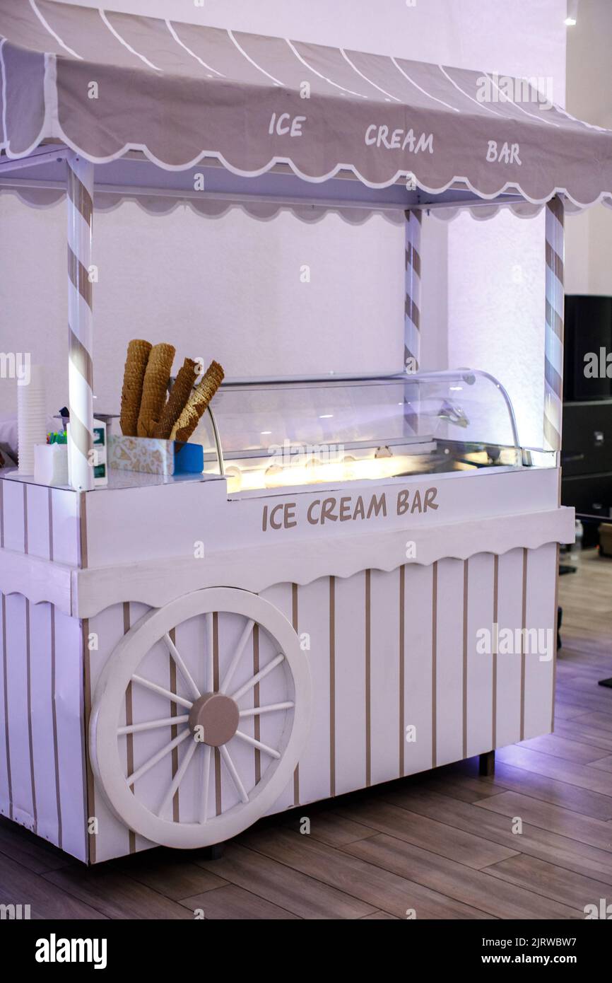 Colorful ice cream cart at the wedding Stock Photo - Alamy