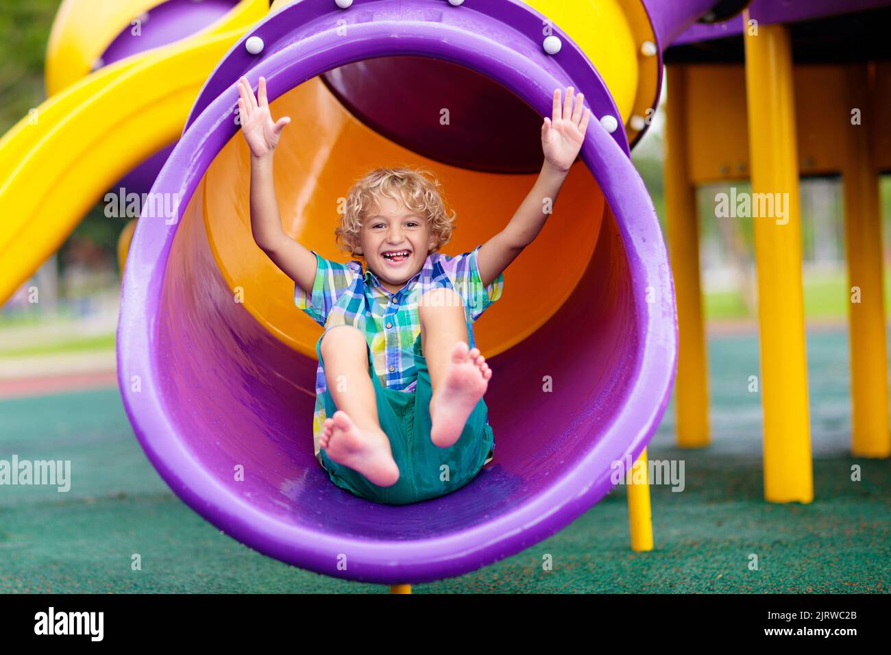 School playground swing slide hi-res stock photography and images - Alamy