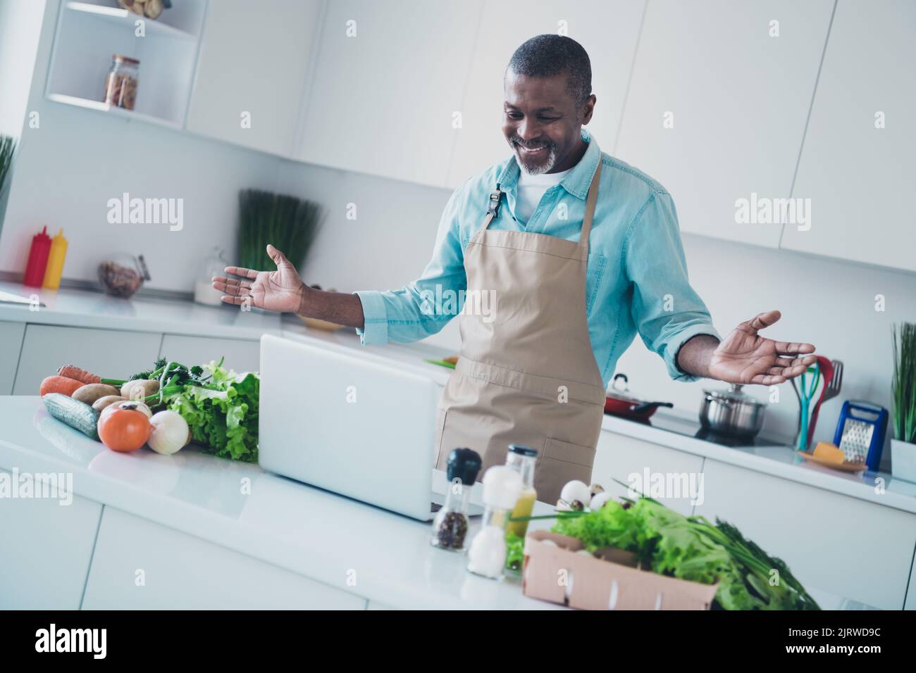 Photo of friendly funny age man wear apron preparing lunch recording ...