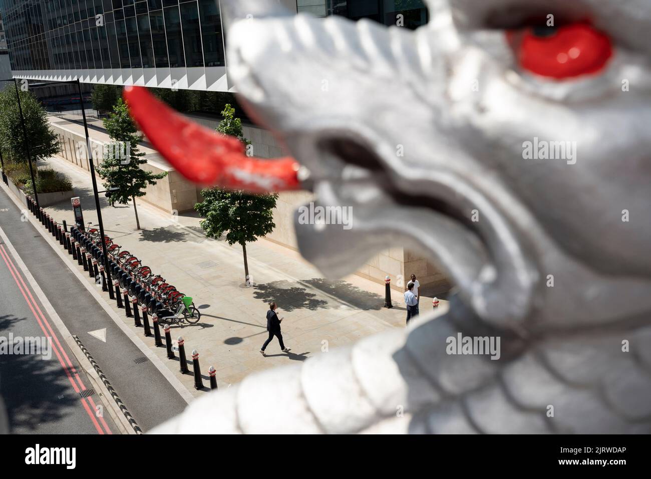 Seen through a symbolic griffin's head and forked toungue is an aerial ...