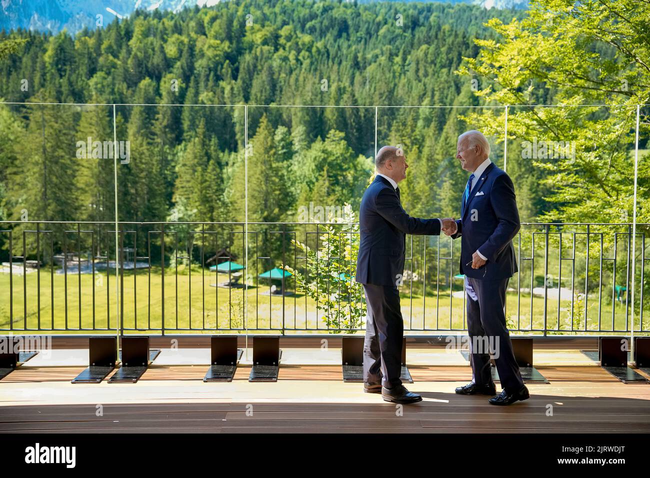 President Joe Biden greets German Chancellor Olaf Scholz, Sunday, June ...