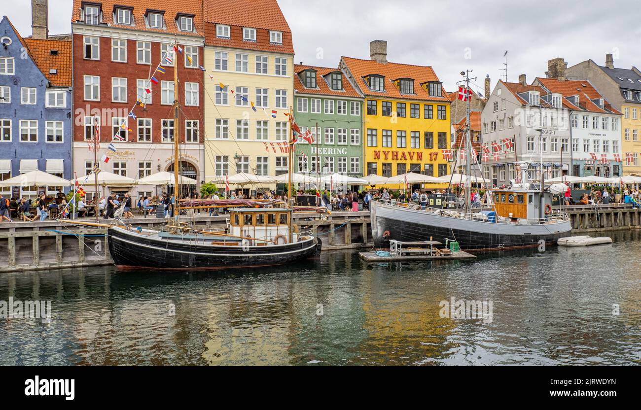 The popular tourist destination of Nyhavn an inlet of the sea lined ...