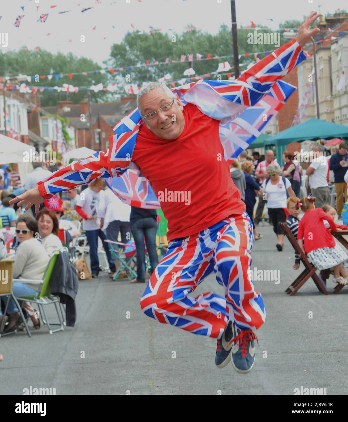 SUNNY PORTSMOUTH. MARTIN LEWIS JUMPING FOR JOY AT A STREET PARTY AT ...