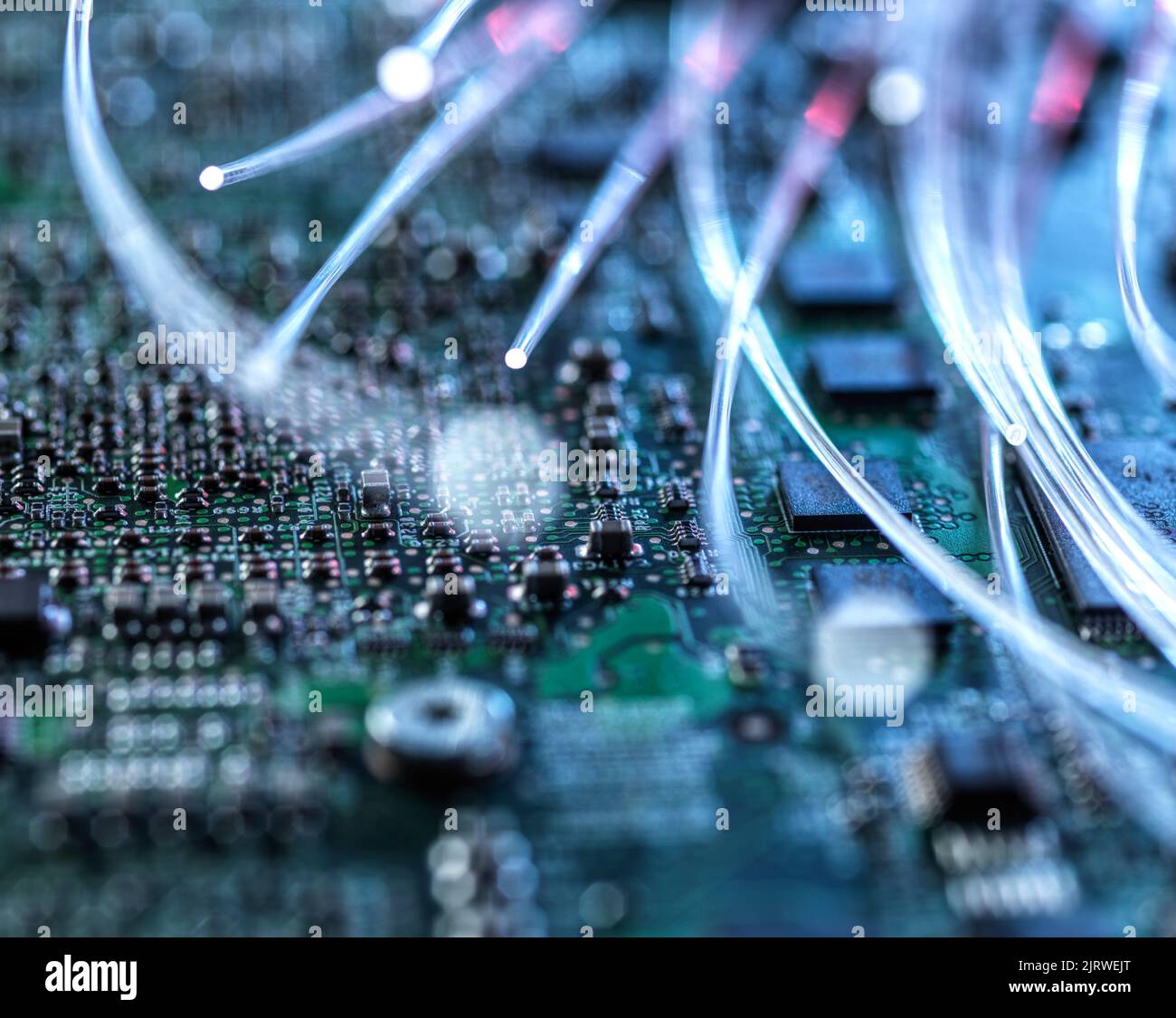Fibre optics carrying data passing through computer circuit boards Stock Photo - Alamy