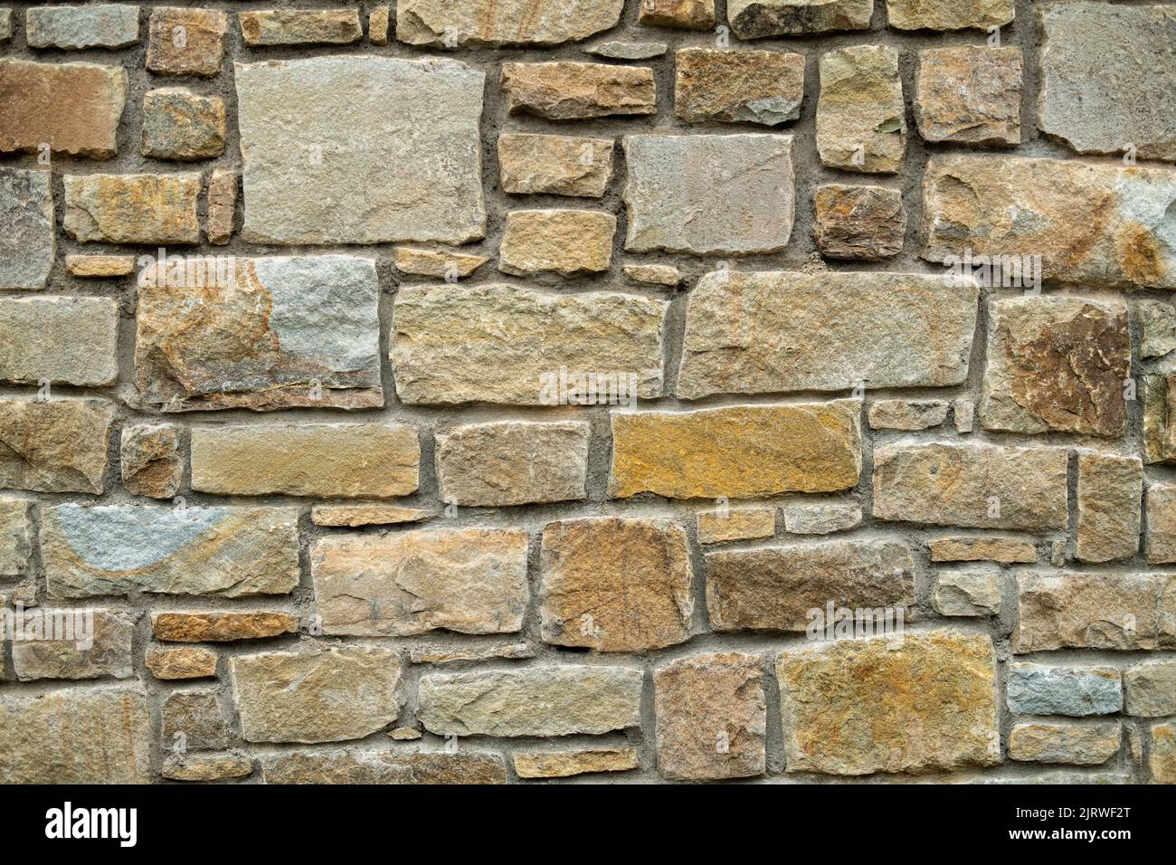 Stone Wall Beige Bricks Background, high built muri Stock Photo - Alamy